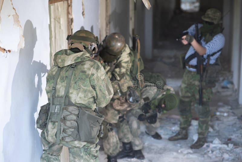 A Team of Professional Airsoft Players Clear the Location from ...