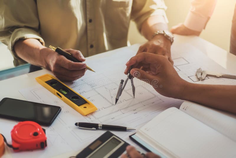 Team of Professional Architects Working Building Plan Design Project ...