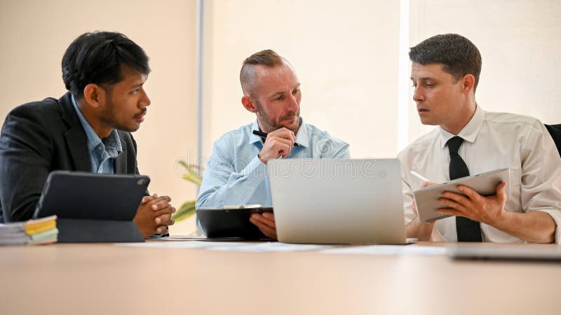 Team of Professional Business Financial Investment Analysts Analyzing ... Team of Professional Business Financial Investment Analysts Analyzing ...