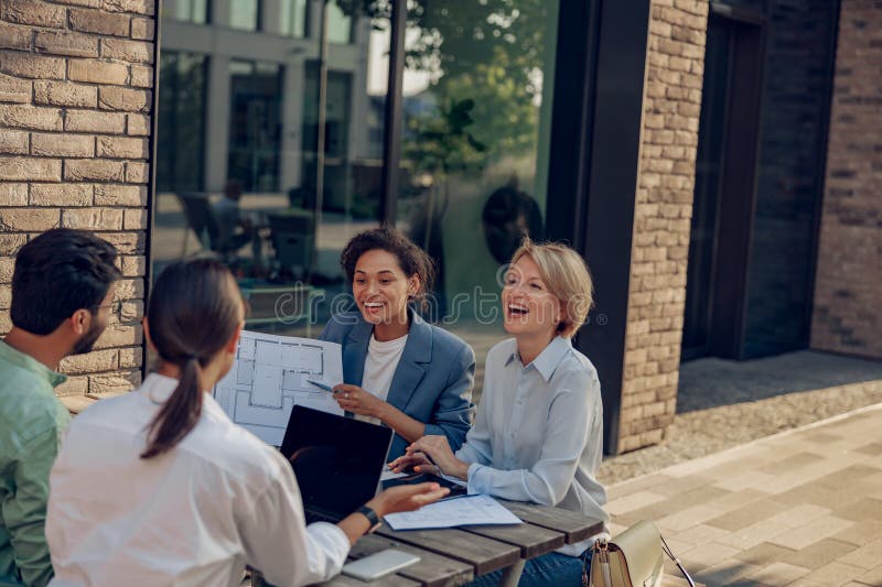 Team of Professional Design Engineers Working with Project Documents in ...