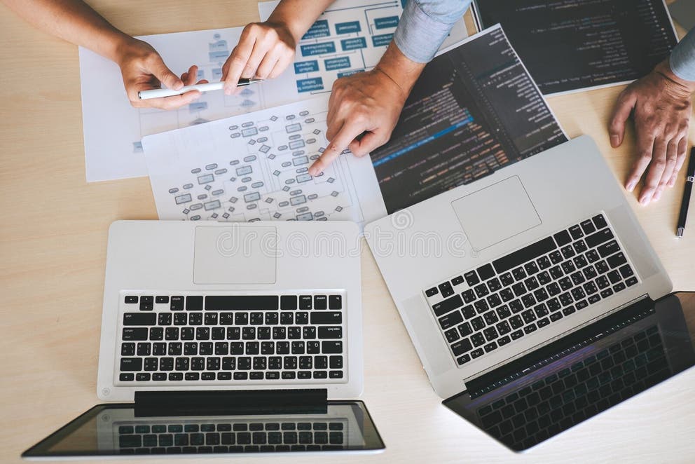 Team of Professional Developer Programmer Cooperation Meeting and Brainstorming and Programming ...