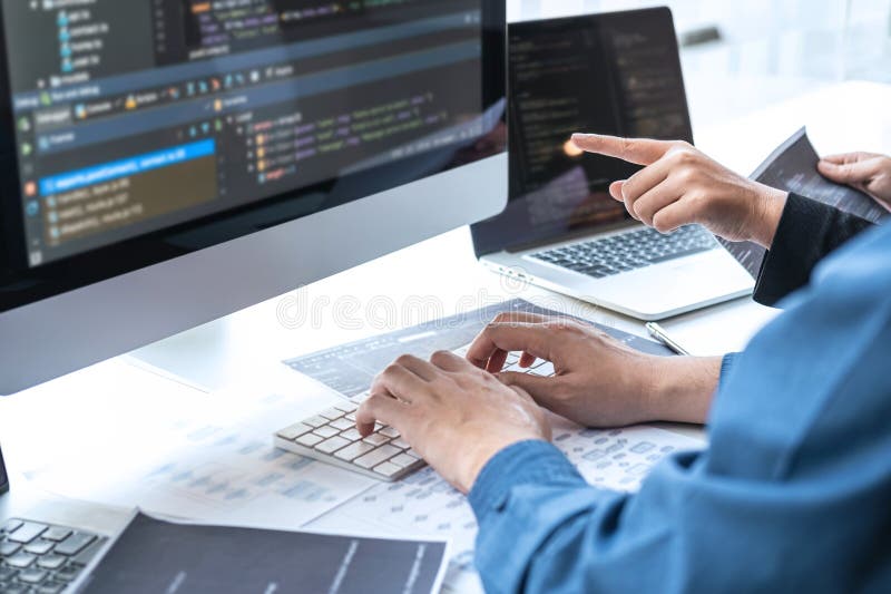 Team of Professional Developer Programmer Cooperation Meeting and Brainstorming and Programming ...