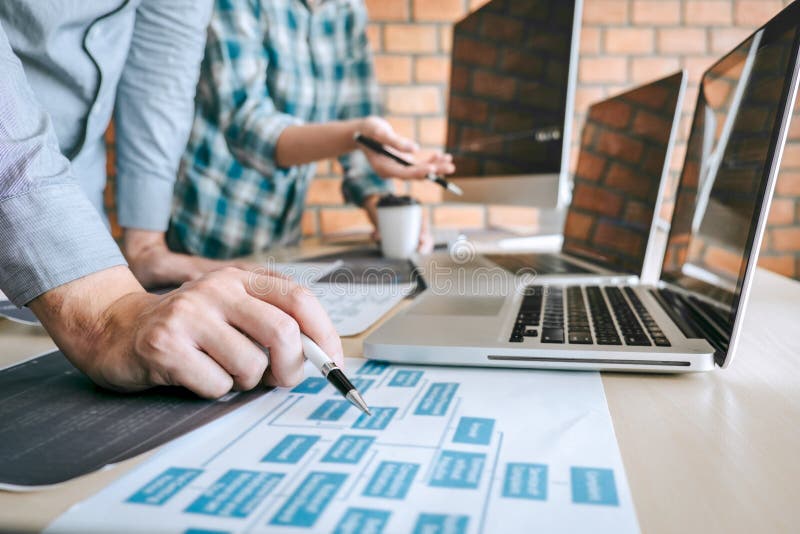 Team Of Professional Developer Programmer Cooperation Meeting And Brainstorming And Programming