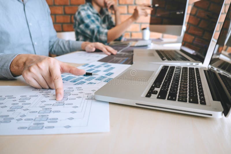 Team of Professional Developer Programmer Cooperation Meeting and Brainstorming and Programming ...