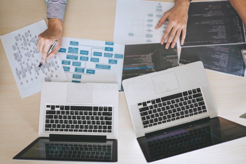 Team Of Professional Developer Programmer Cooperation Meeting And Brainstorming And Programming