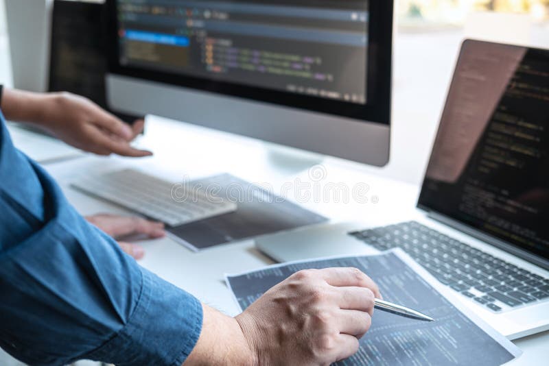 Team Of Professional Developer Programmer Cooperation Meeting And Brainstorming And Programming