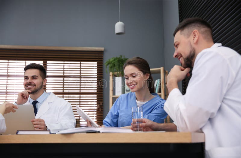 Team of Professional Doctors Having Meeting Stock Photo - Image of male ...