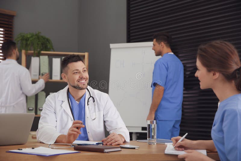 Doctors Having a Medical Discussion in a Meeting Room Stock Image ...