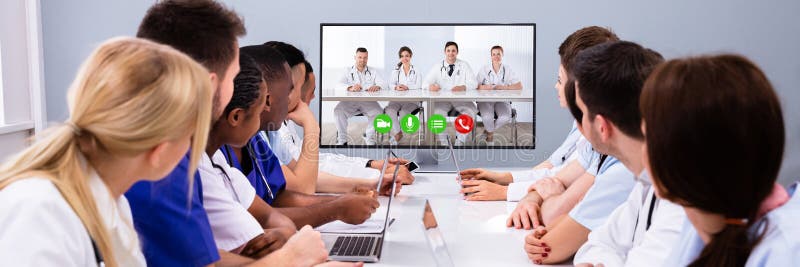 Doctors Having Video Conference Meeting in Hospital Stock Photo - Image ...
