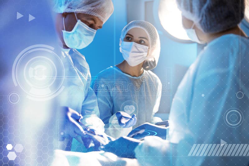 Team of Professional Doctors Performing Operation in Surgery Room and ...