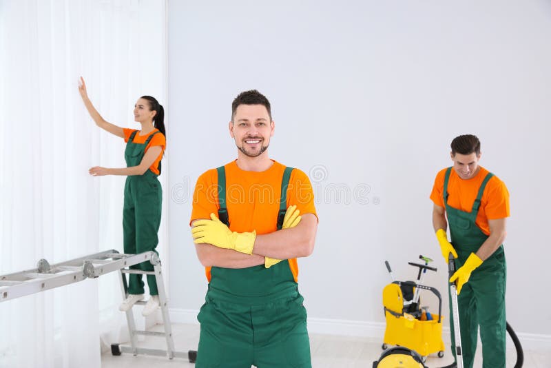 Team of Janitors Cleaning Room after Renovation Stock Photo - Image of ...