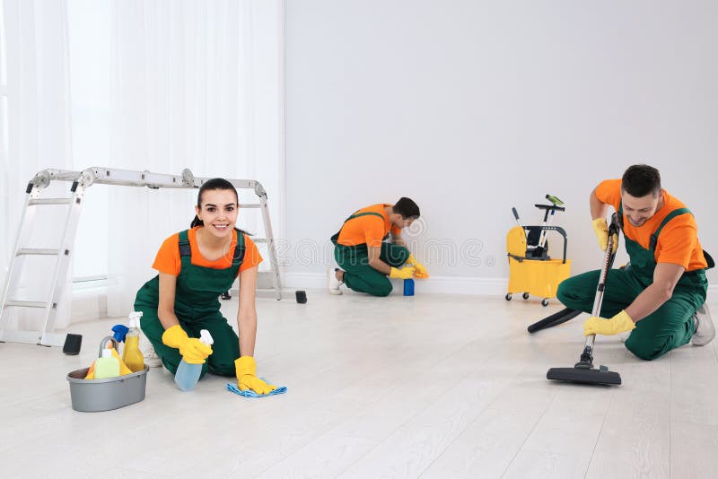 Team of Janitors Cleaning Room after Renovation Stock Image - Image of ...
