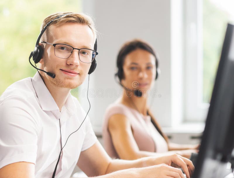 Team of Professional Support Staff Working in the Office. Colleagues in ...