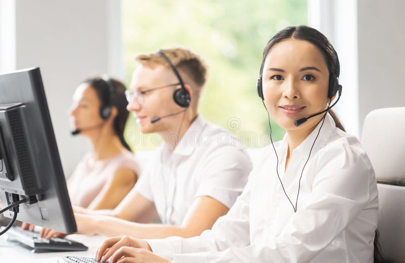 Team of Professional Support Staff Working in the Office. Colleagues in ...