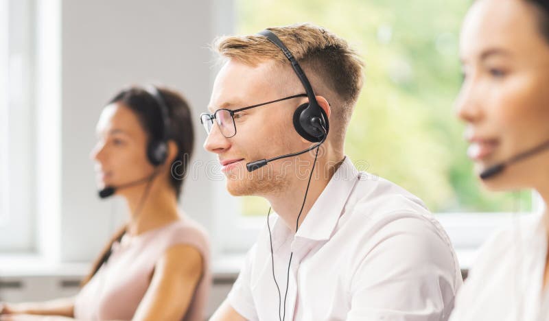 Team of Professional Support Staff Working in the Office. Colleagues in ...