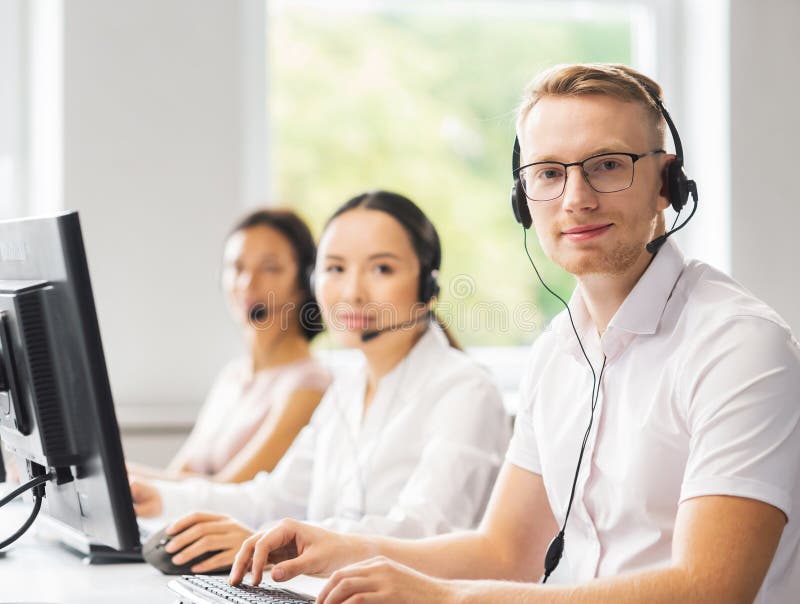 Team of Professional Support Staff Working in the Office. Colleagues in ...