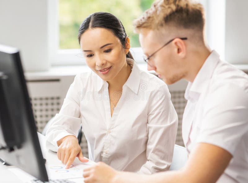 Team of Professional Support Staff Working in the Office. Colleagues in ...