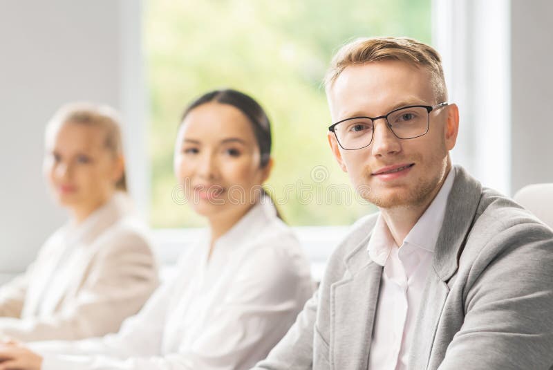 Team of Professional Support Staff Working in the Office. Colleagues in ...