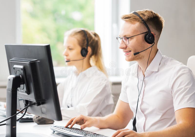 Team of Professional Support Staff Working in the Office. Colleagues in ...