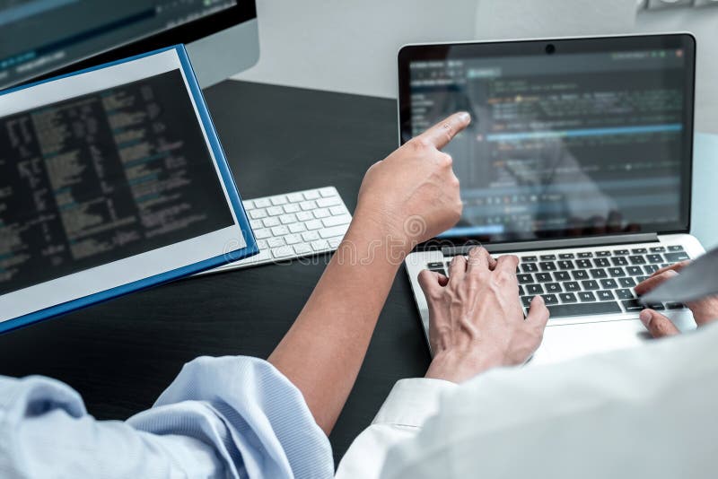 Writing Codes and Typing Data Code Technology, Programmer Cooper Stock ...