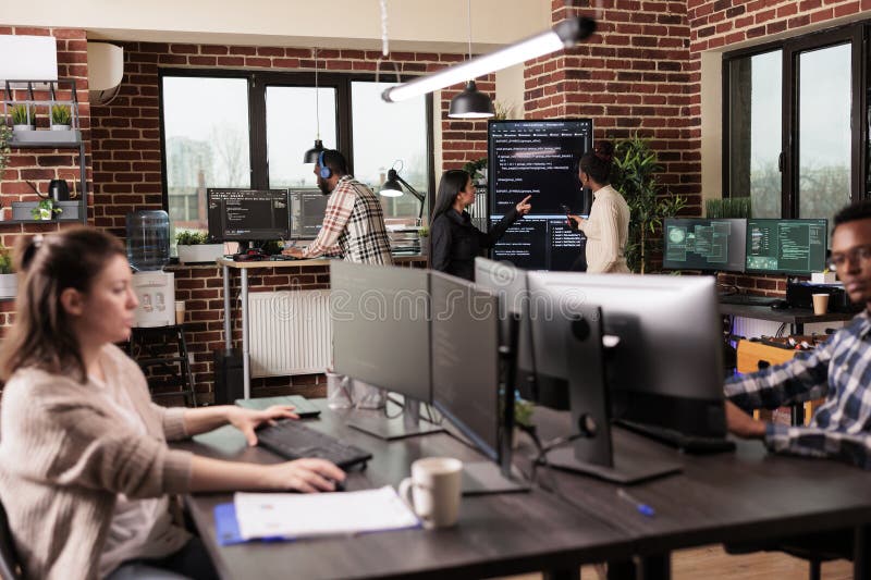Team of Programmers Analyzing Machine Learning App Code Stock Photo ...