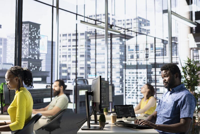 Team of Programmers Monitoring and Maintaining Company Systems Stock ...