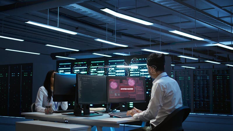 Team of Programmers in Server Hub Trying To Protect Hardware from Hacker Stock Photo - Image of ...
