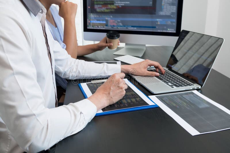 Team Of Programmers Working With Computer Programming Professional Development And Coding
