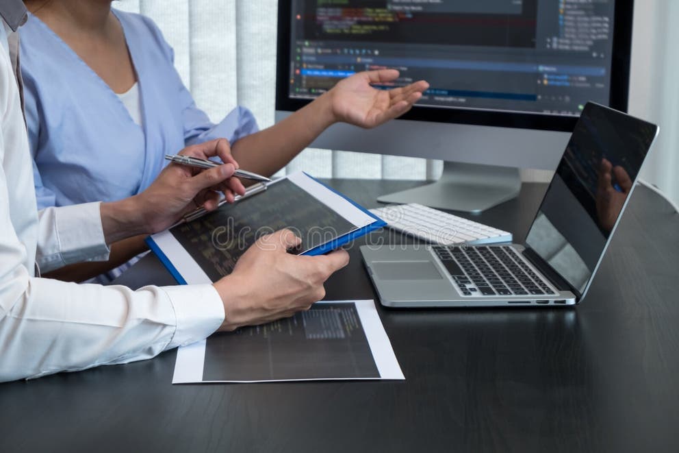Team of Programmers Working with Computer Programming, Professional Development, and Coding ...