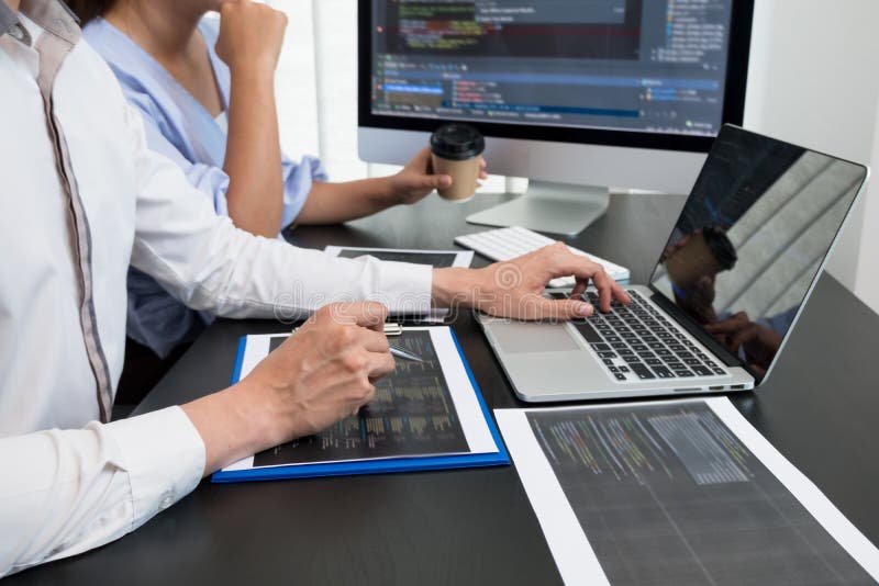 Team of Programmers Working with Computer Programming, Professional Development, and Coding ...