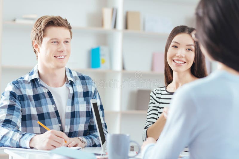 Optimistic Students Preparing for Classes Together Stock Image - Image ...