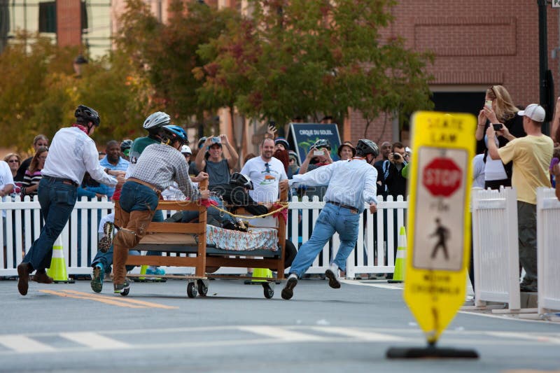 Team Pushes Bed Around Corner in Mattress Race Editorial Stock Photo ...