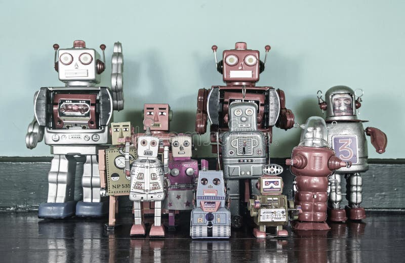 Retro Tin Toy Robots on a Bookshelf Stock Photo - Image of collectable ...