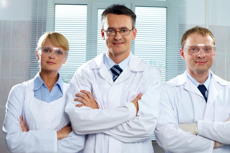 Team of scientists stock image. Image of looking, laboratory - 26269163 Team of scientists stock image. Image of looking, laboratory - 26269163