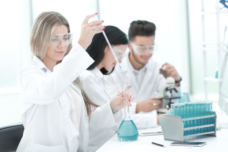 Scientists Conduct Research in the Laboratory Stock Image - Image of ...