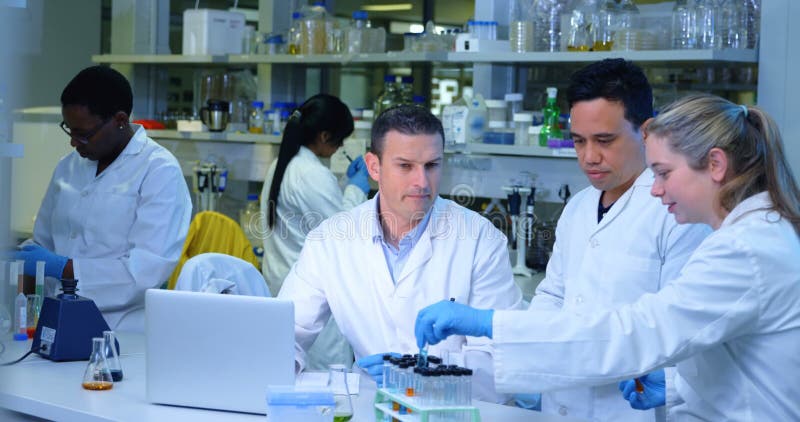 Team of Scientists Interacting with Each Other 4k Stock Video - Video ...