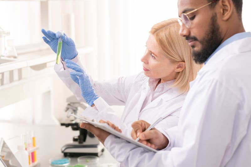 Serious scientists stock image. Image of medicine, portrait - 26269161