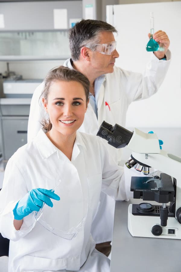 Team of scientists at work stock photo. Image of science - 48952492