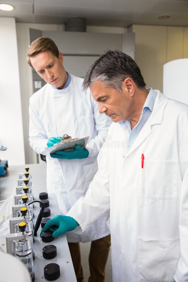 Team of Scientists Working Together Stock Image - Image of science ...