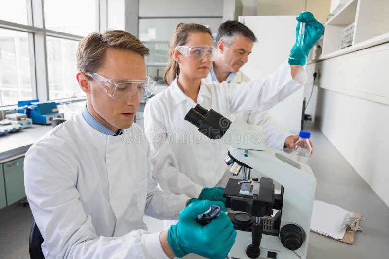 Team of Scientists Working Together Stock Photo - Image of science ...