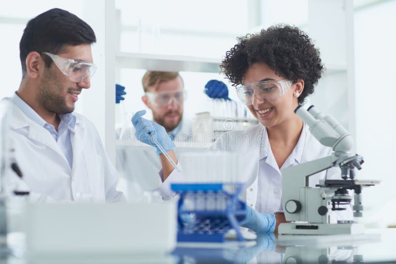 Team of Medical Research Scientists Working on Generation Experimental ...