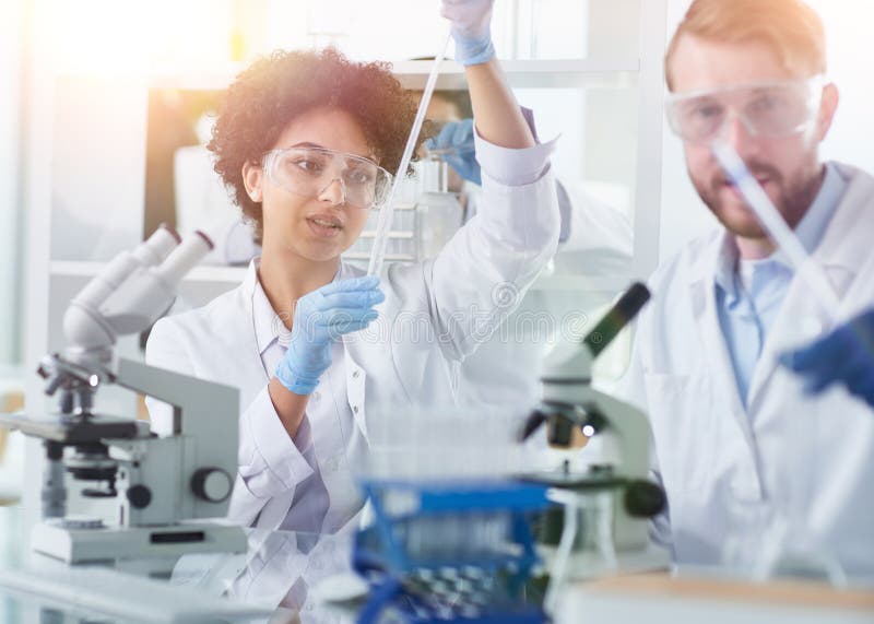 Team of Medical Research Scientists Working on Generation Experimental ...