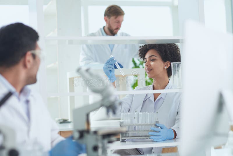 Team of Medical Research Scientists Working on Generation Experimental ...