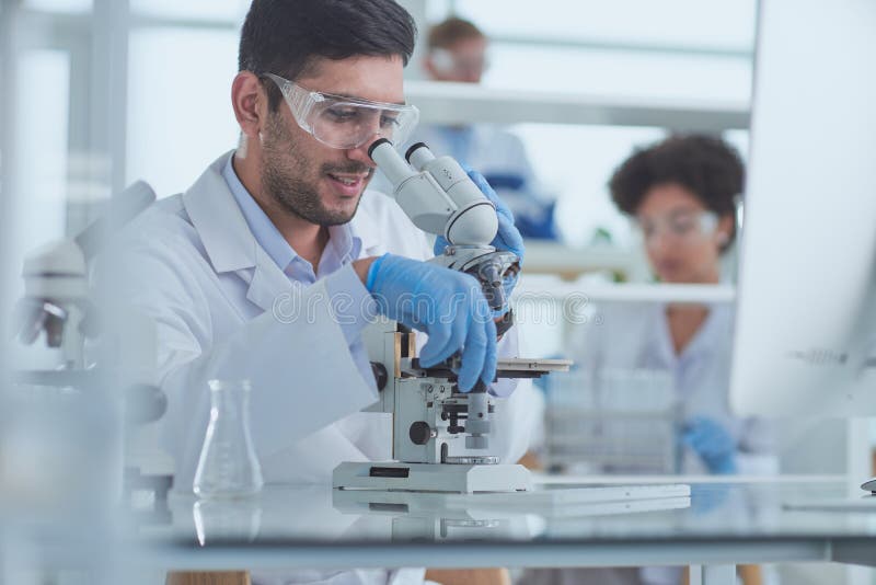 Team of Medical Research Scientists Working on Generation Experimental ...