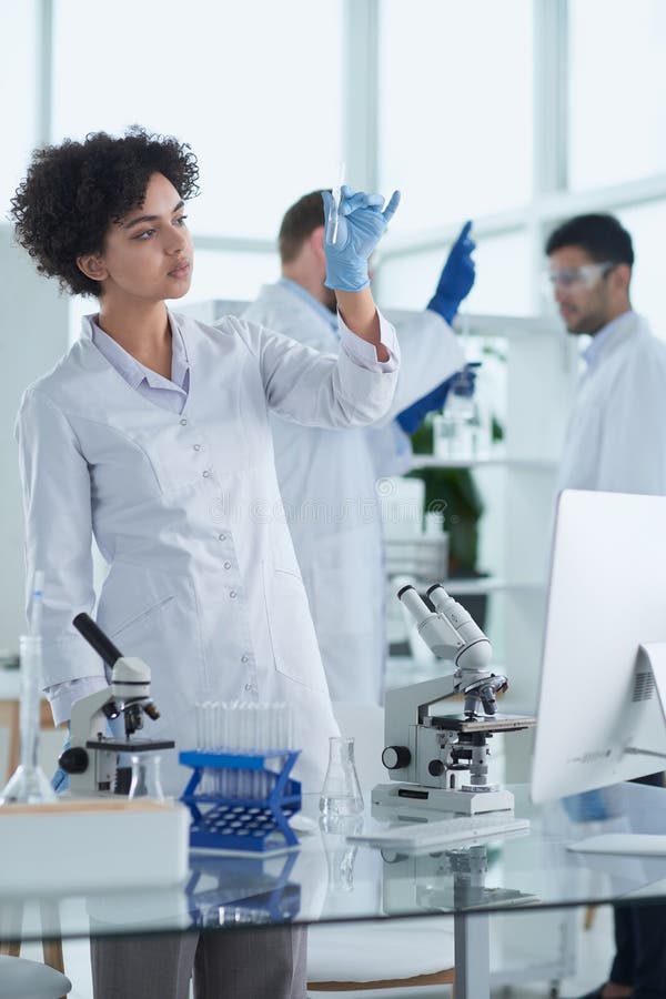 Team of Medical Research Scientists Working on Generation Experimental ... Team of Medical Research Scientists Working on Generation Experimental ...