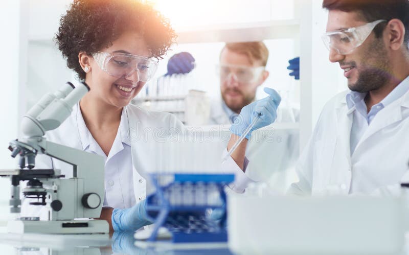 Team of Medical Research Scientists Working on Generation Experimental ...