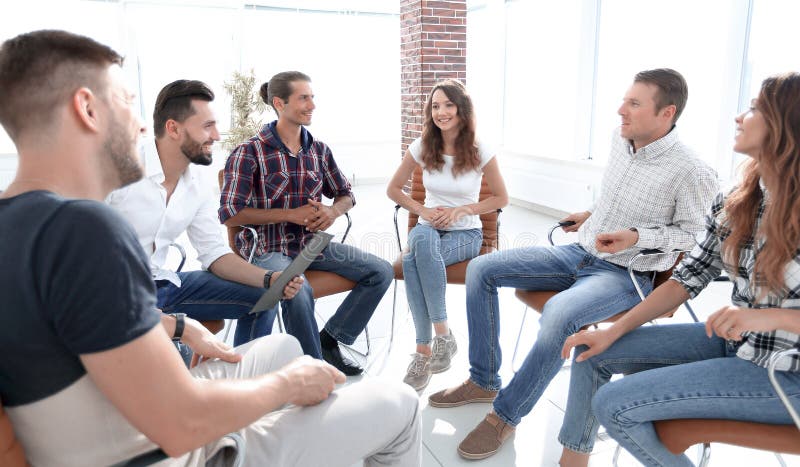 Team Sitting in a Lesson on Team Building Stock Photo - Image of chair ...