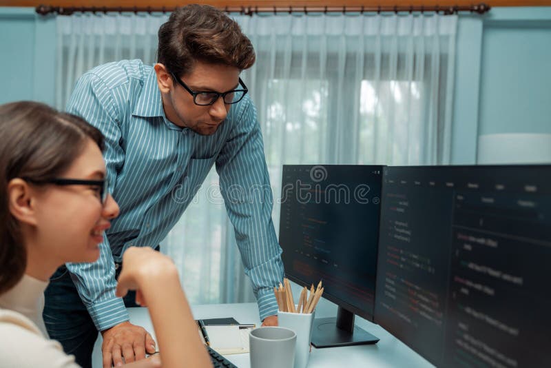 Asian and Indian Developer Team Clapping Hand for Project Success with Software Computer at ...