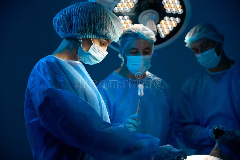Team of Skilled Surgical Doctors Operating in Operating Room Stock ...