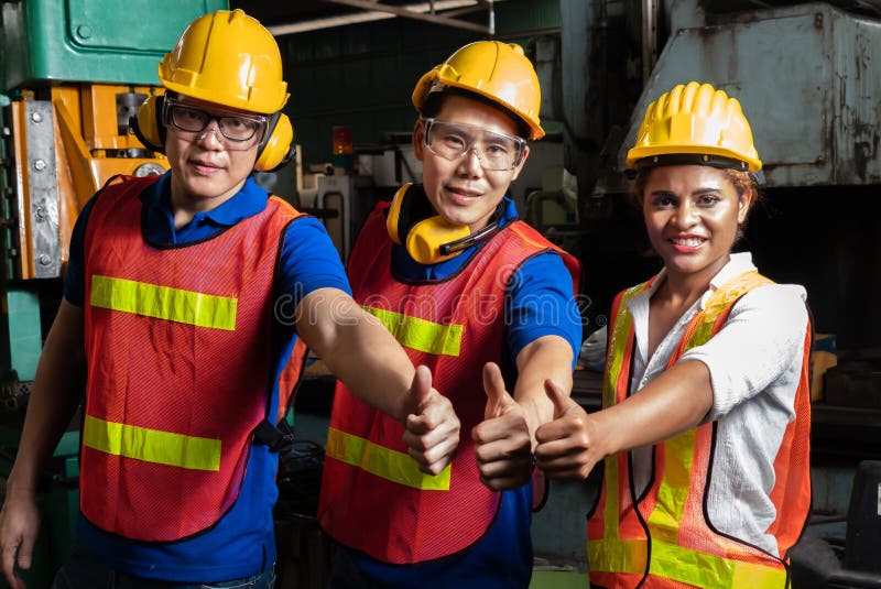 Team of Skillful Factory Workers Showing Unity Partnership and Support ...